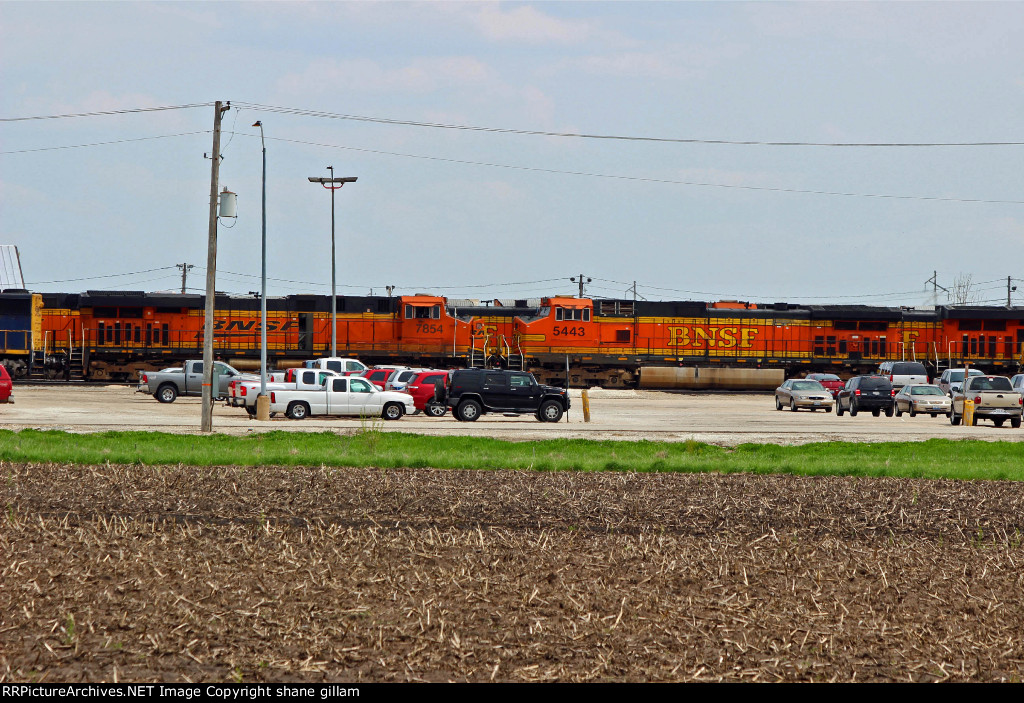 BNSF 7854 more orange.